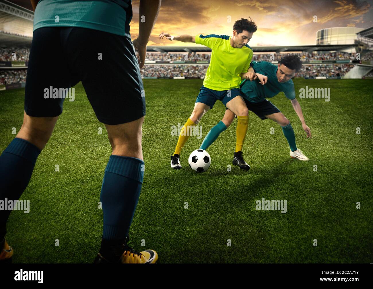 Playing football player on the pitch Stock Photo - Alamy