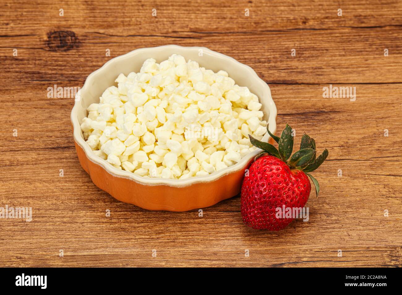 Dietary food - grain cottage cheese in the bowl Stock Photo - Alamy