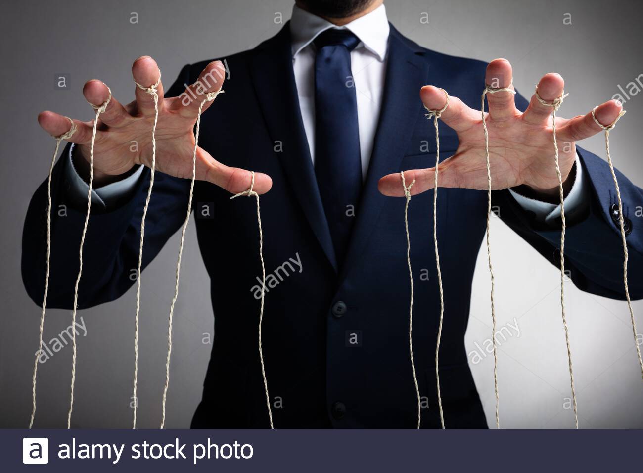 Man Hand Puppet Strings High Resolution Stock Photography and Images ...