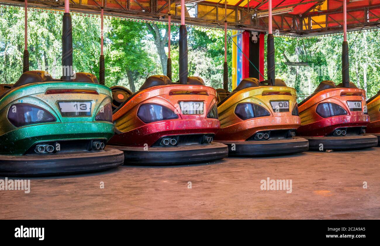 Colored electric bumper cars or dodgem cars parked Stock Photo - Alamy