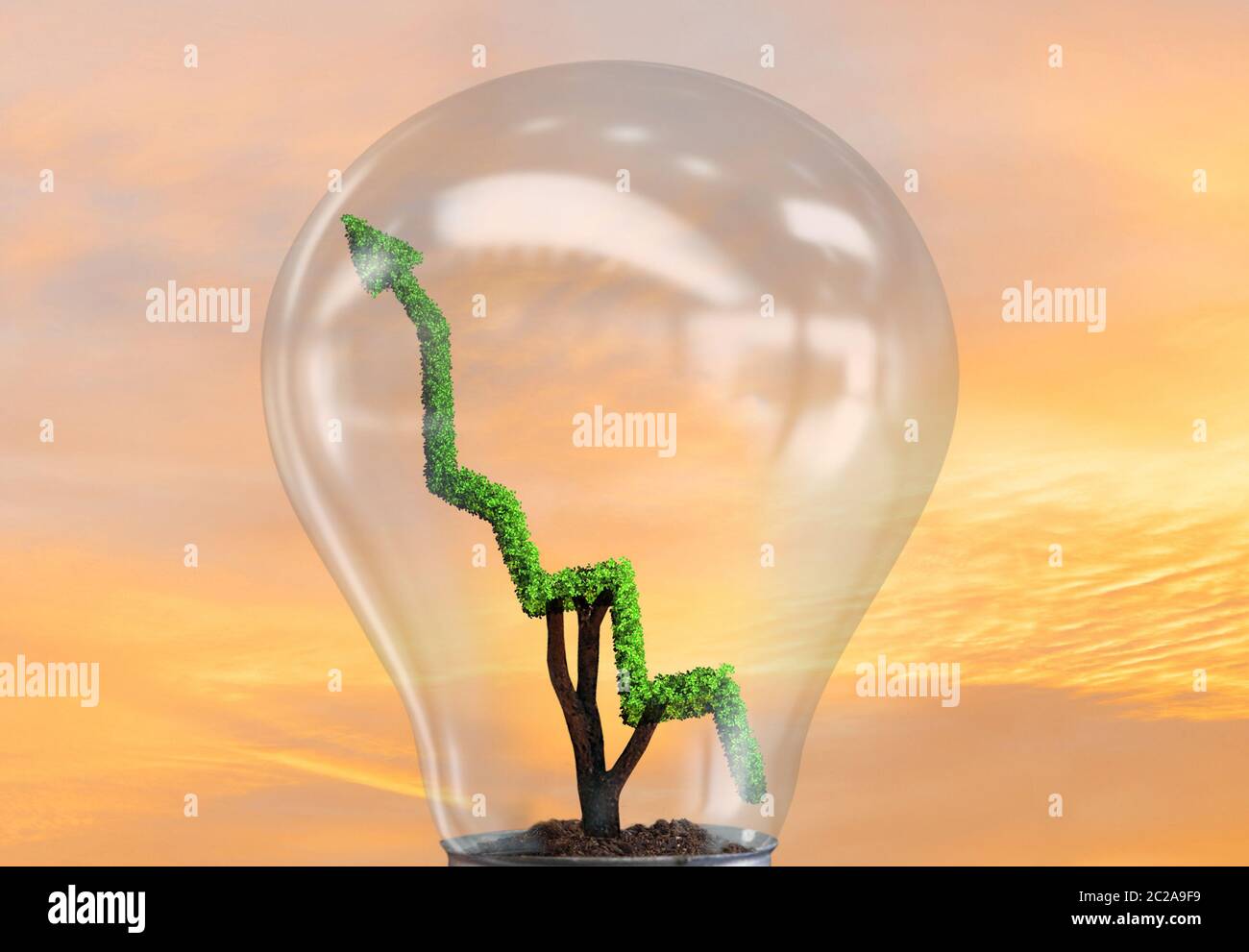 Green energy concept with green line graph in light bulb Stock Photo ...