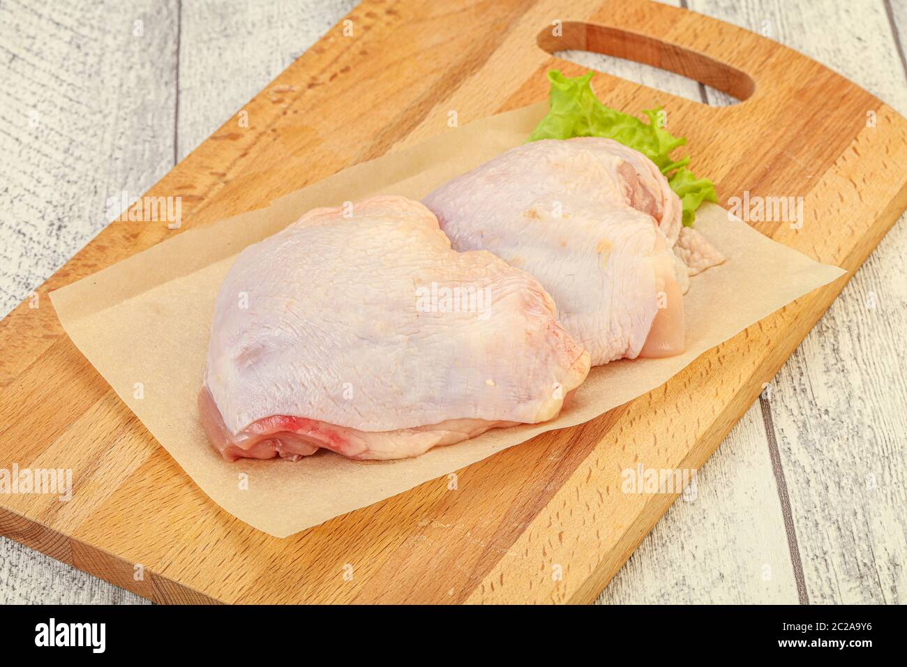 Raw chicken hip ready for cooking Stock Photo - Alamy