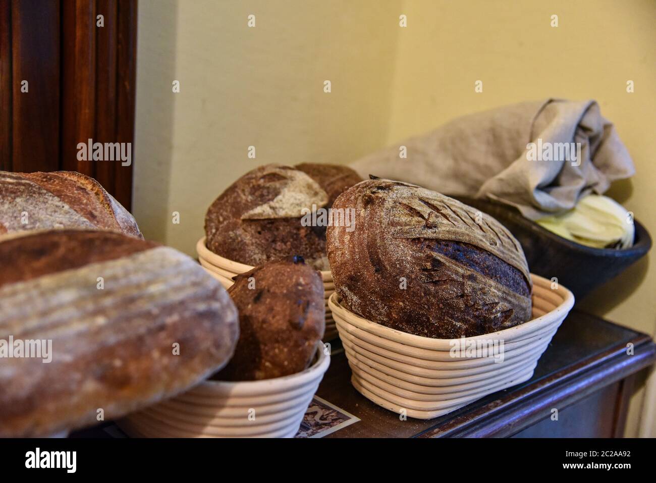 A fresh crusty loaf of homemade bread. Homemade rustic sour. Brown ...