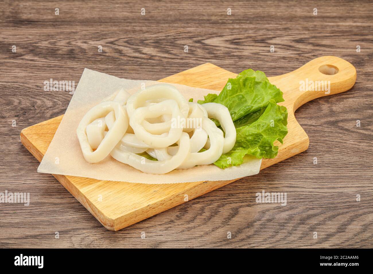 Raw squid rings ready for cooking Stock Photo - Alamy