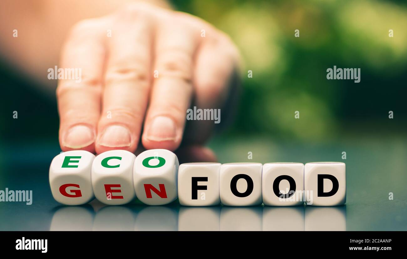 Hand turns dice and changes the expression "GEN Food") ("genetic ...