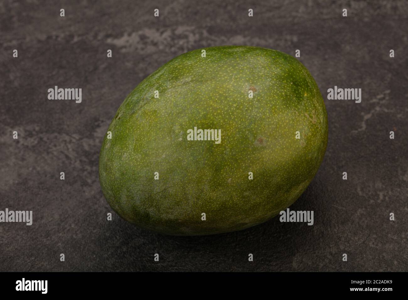 Tropical fruit - Green sweet tasty mango Stock Photo - Alamy