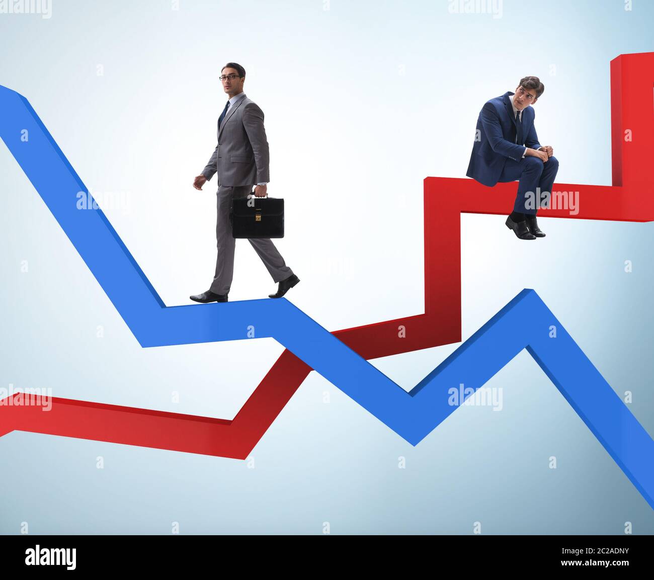 Businessman with charts of growth and decline Stock Photo - Alamy