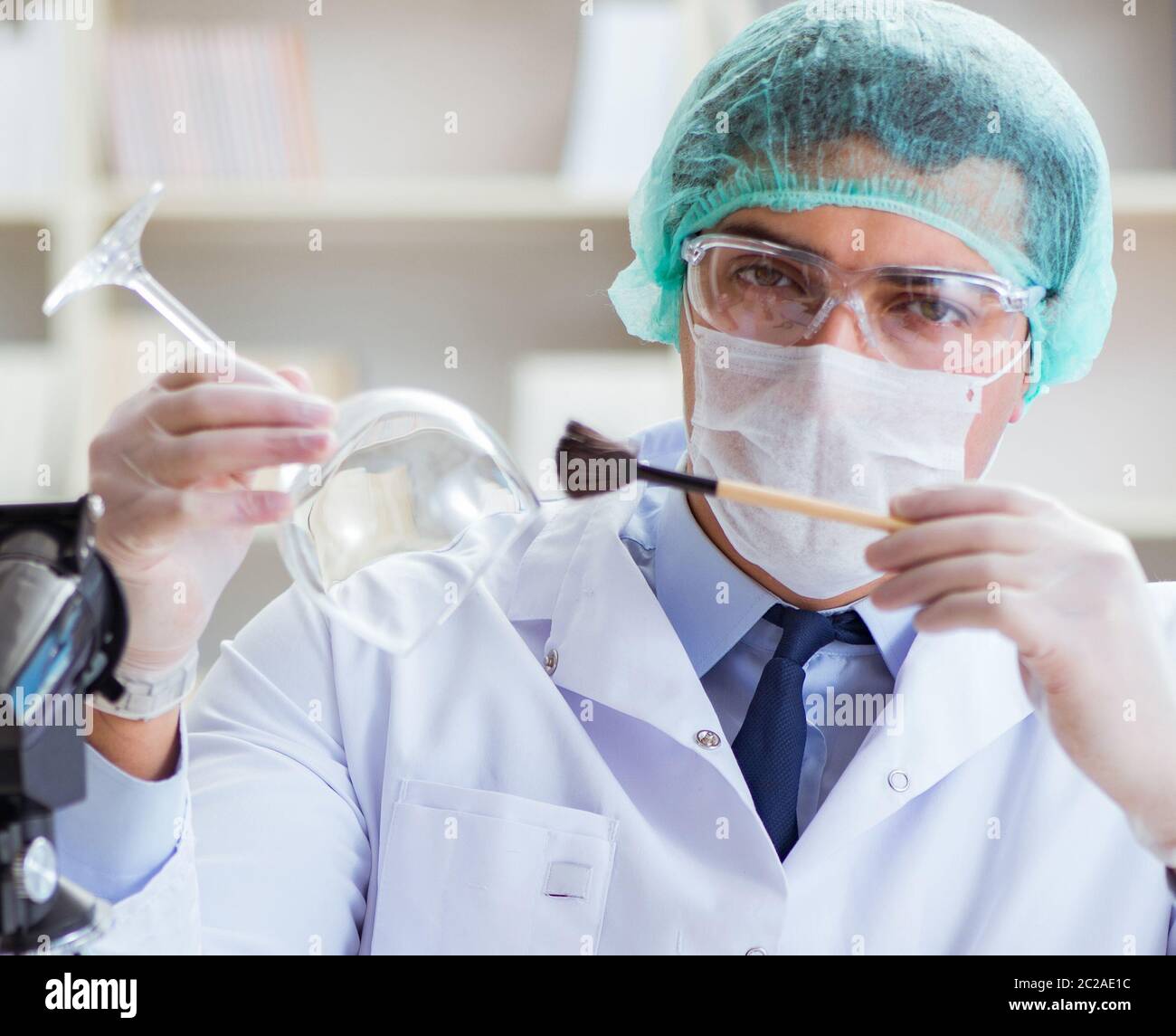 Forensics investigator working in lab on crime evidence Stock Photo - Alamy