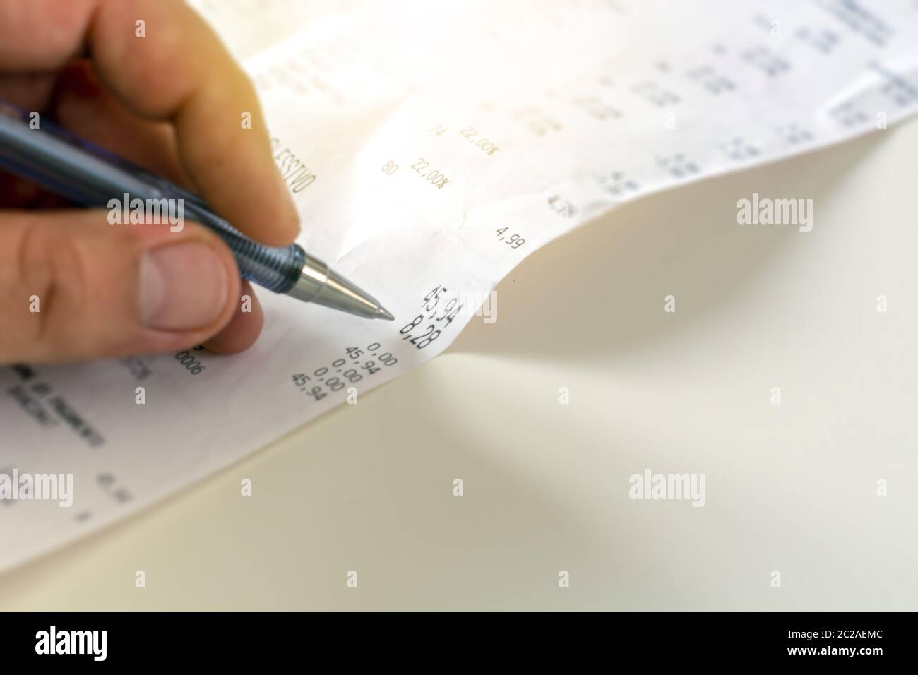 checking a receipt by analyzing the numbers, expenses and profits Stock ...