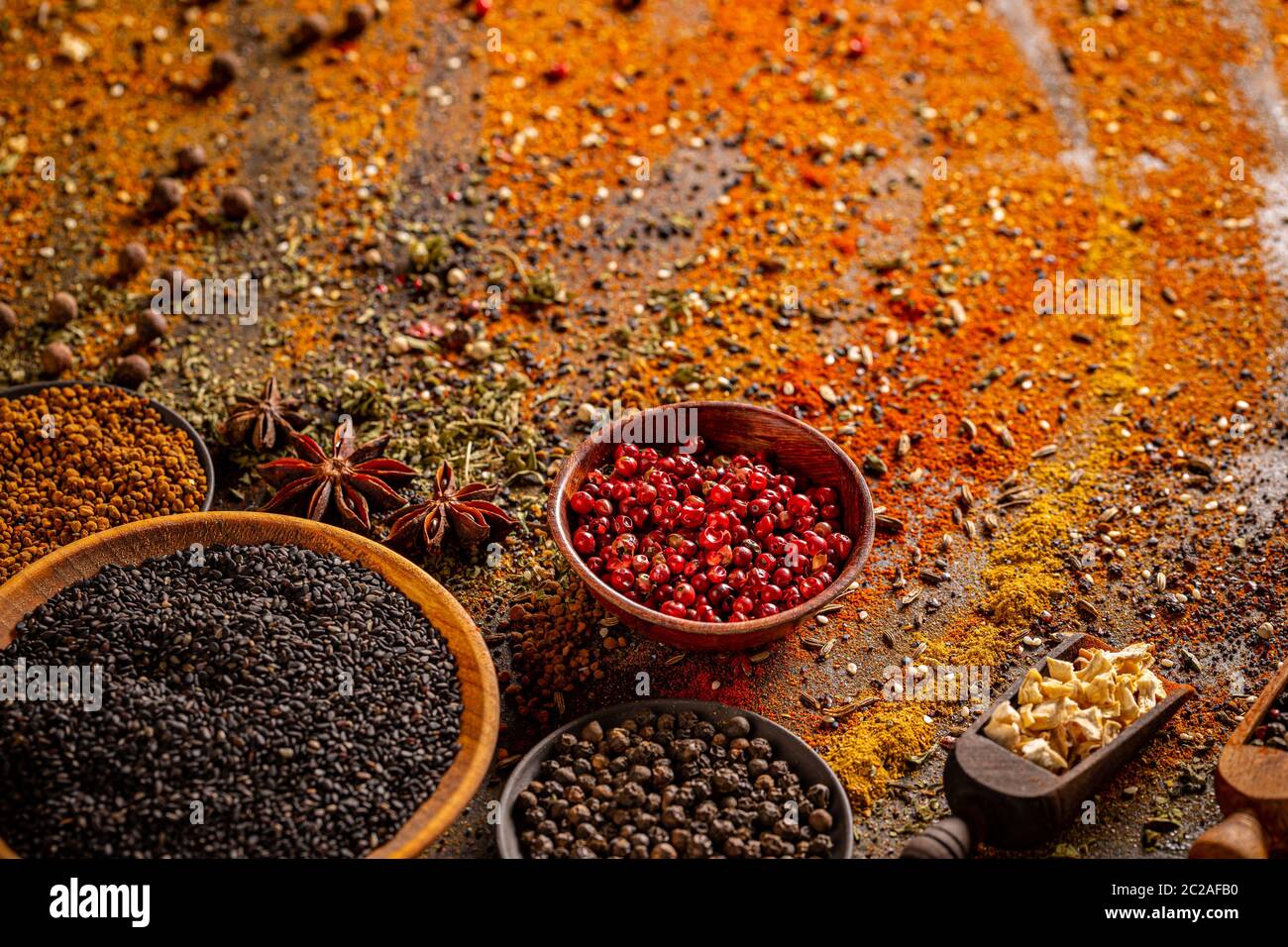 Set of condiments on spices texture background Stock Photo - Alamy