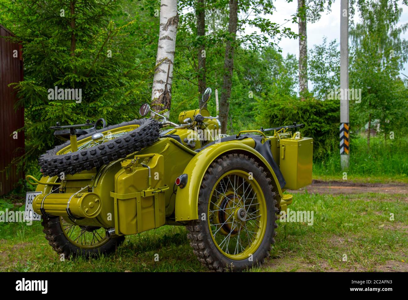 Restored bright green retro motorcycle with sidecar Stock Photo - Alamy