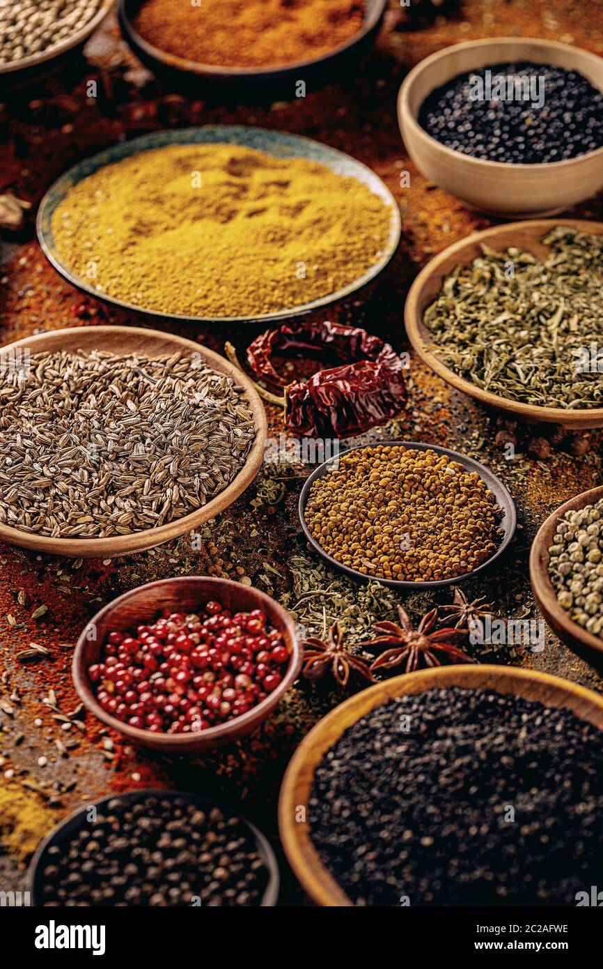 Variety of spices in bowls. Spices composition Stock Photo - Alamy