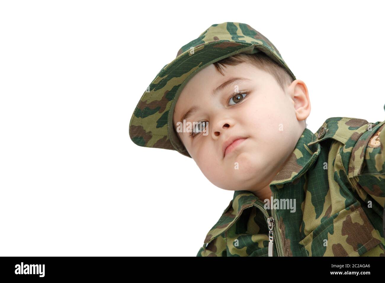 little Caucasian boy in military clothes isolated on light background ...