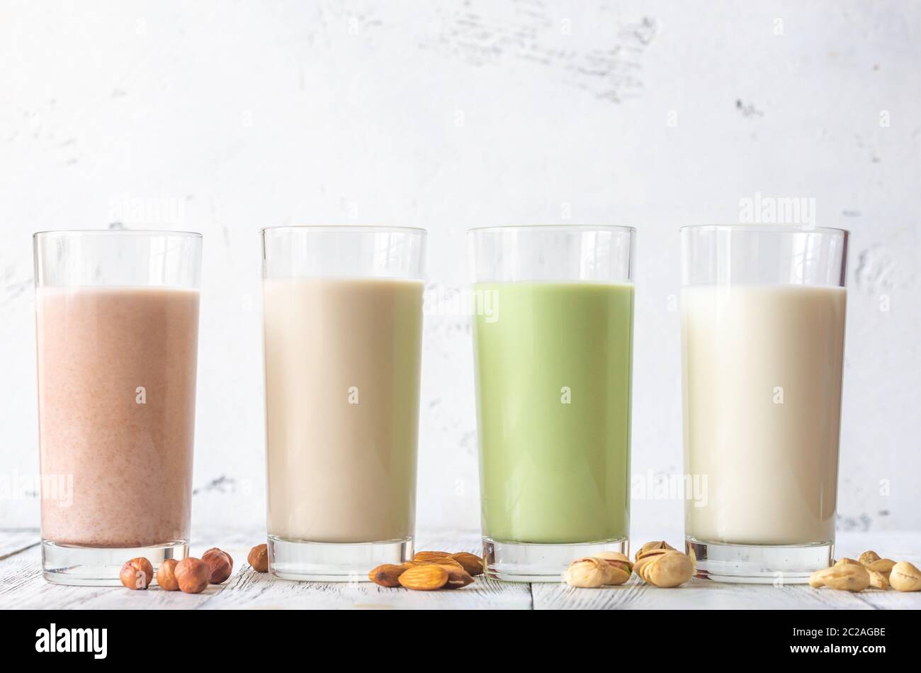 Assortment of different kinds of nut milk Stock Photo - Alamy