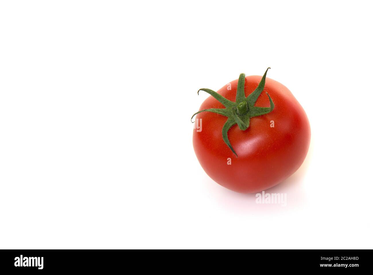 Single real tomato seen at its top isolated on a white background Stock ...