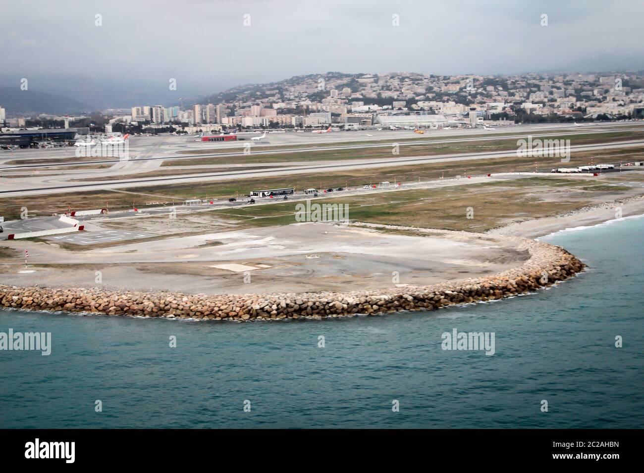 helicopter approaching the landing pad at an airport Stock Photo - Alamy