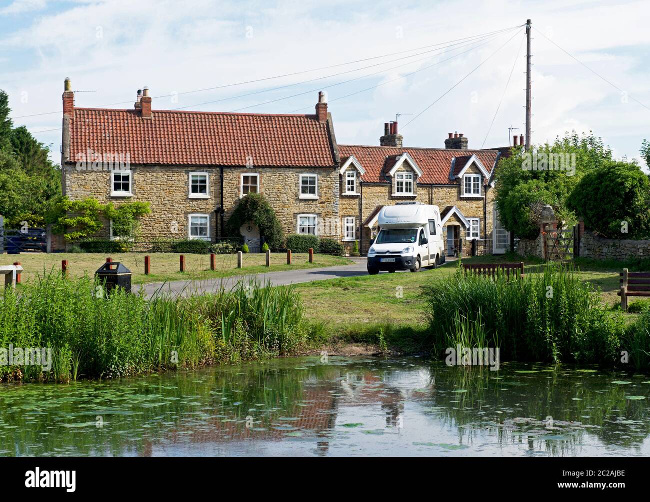 Duck pond in the village of Brantingham, East Yorkshire, England UK ...