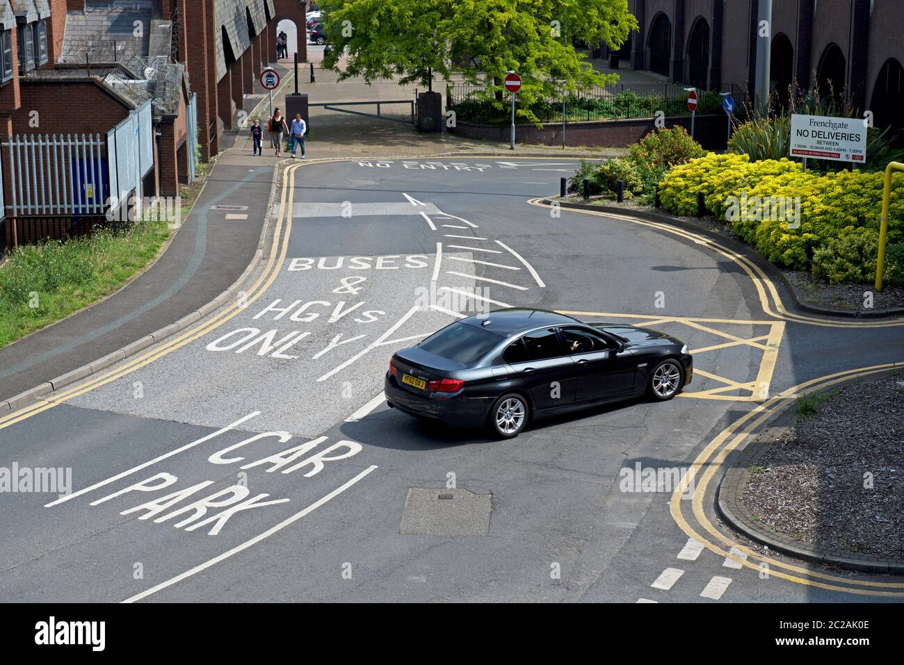 Car at road junction, turning into car park, in Doncaster, South ...