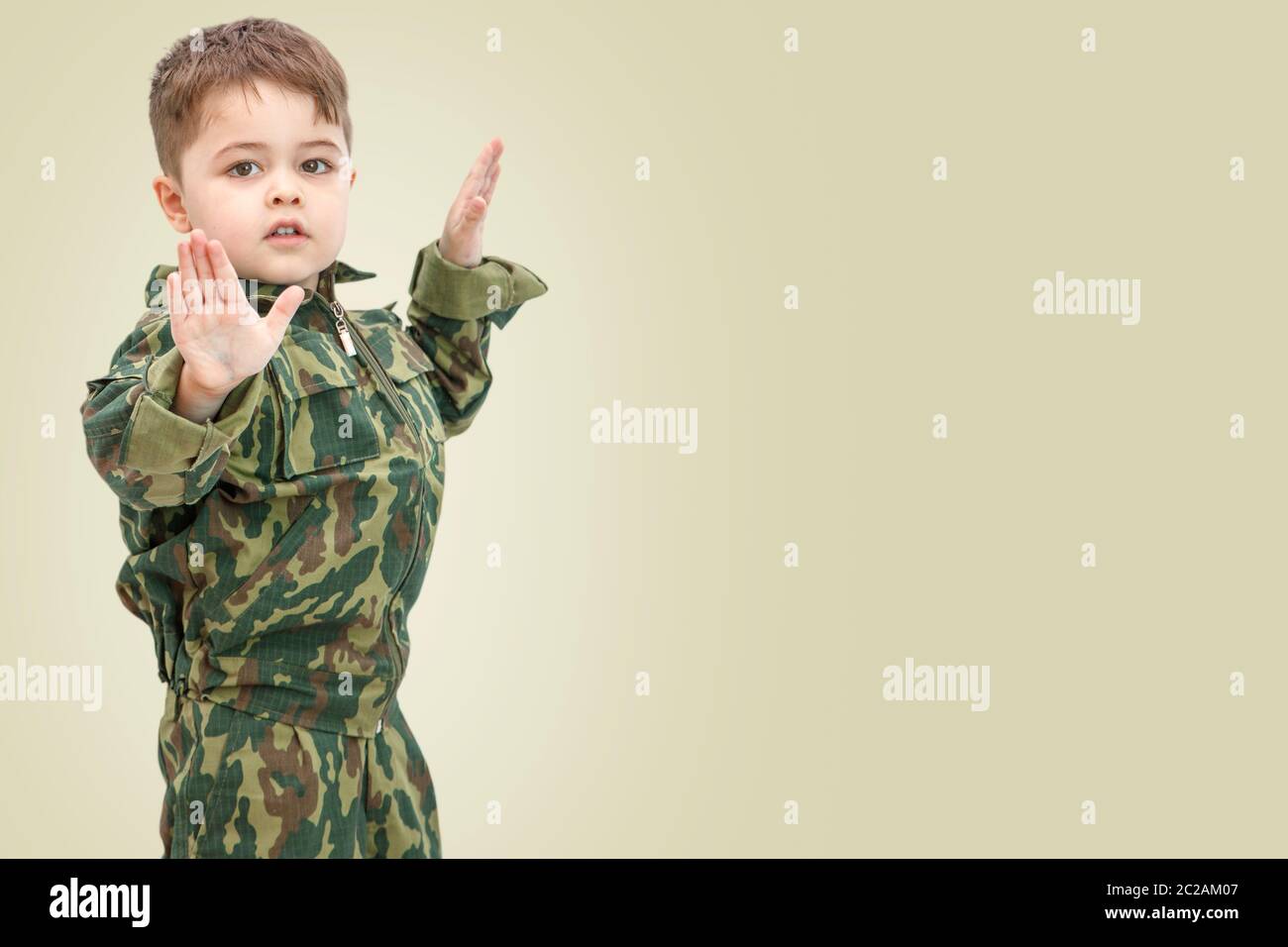 Boy in military uniform hi-res stock photography and images - Alamy