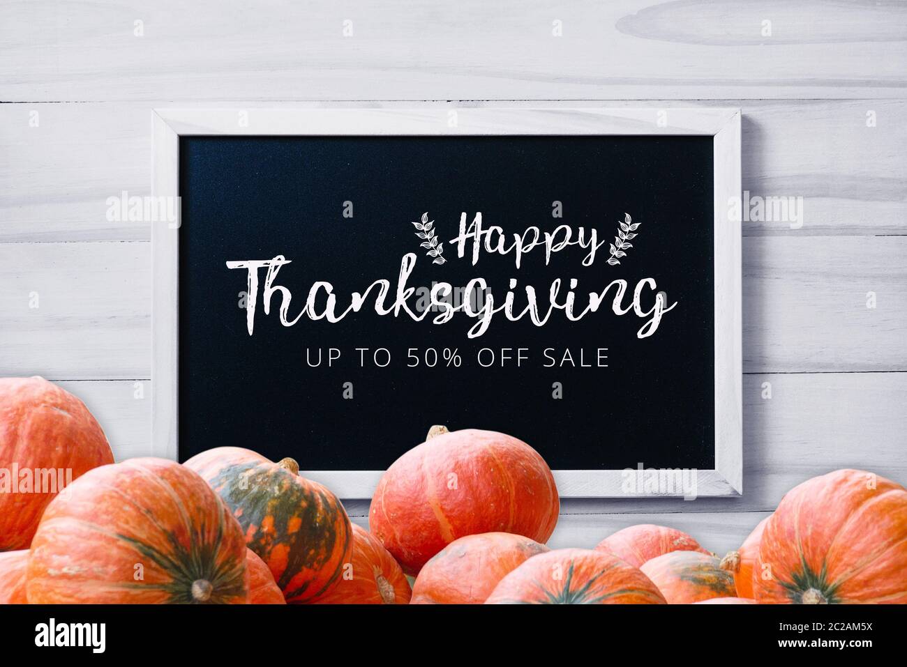 Thanksgiving promotion banner on blackboard on wood white background ...