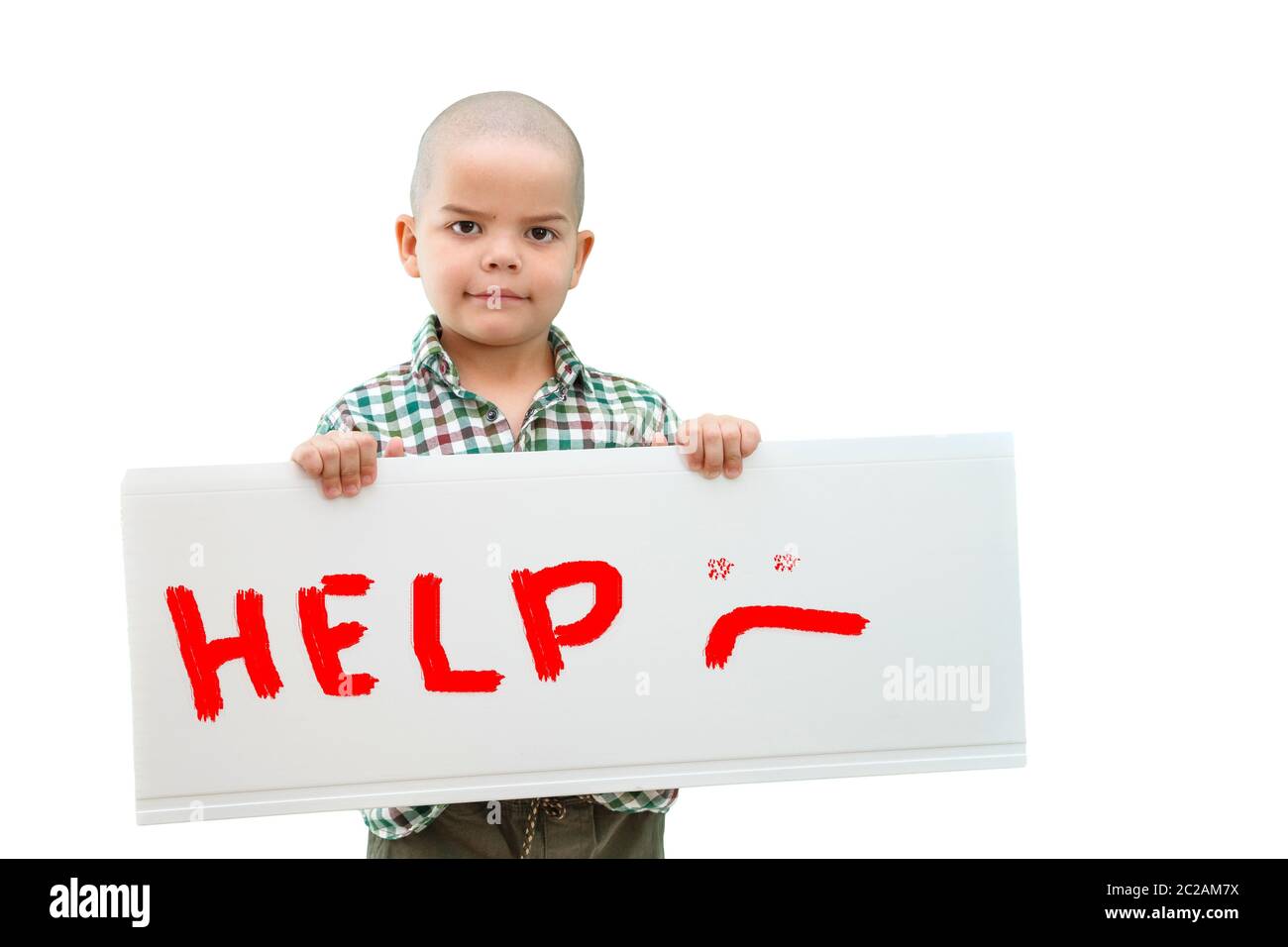 boy holding a sign help the children in the hands. In light background ...