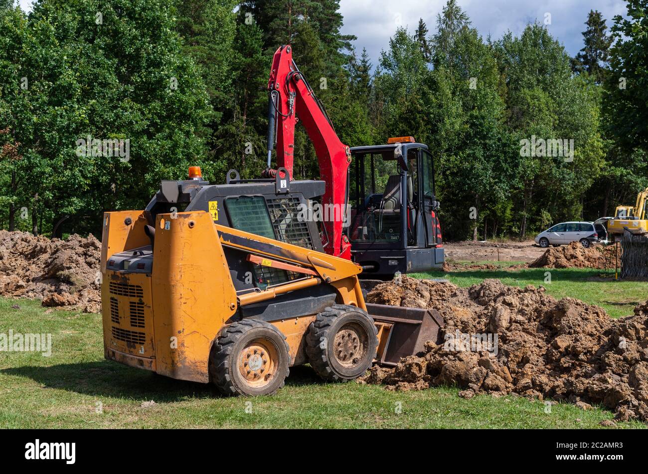 Mini excavator hi-res stock photography and images - Alamy