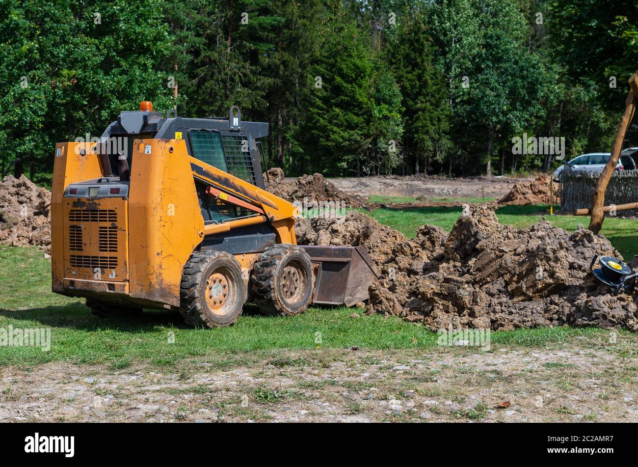Mini digger worker hi-res stock photography and images - Alamy