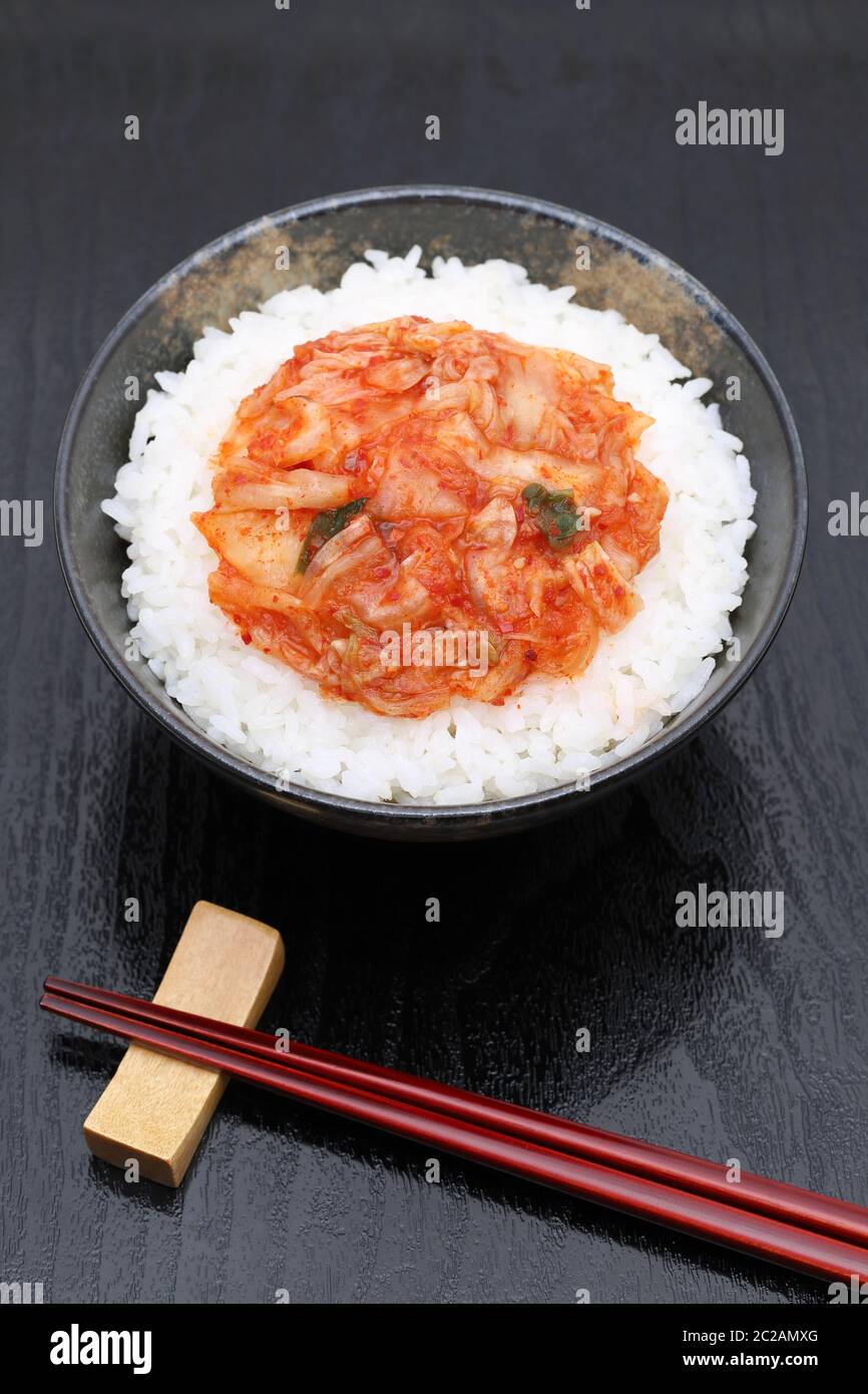 Korean food, cooked white rice with kimchi Stock Photo - Alamy