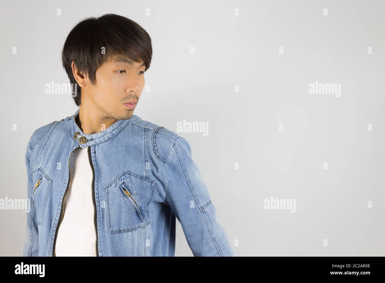 Young Asian Man in Jeans Jacket or Denim Jacket on Left Frame. Denim or ...