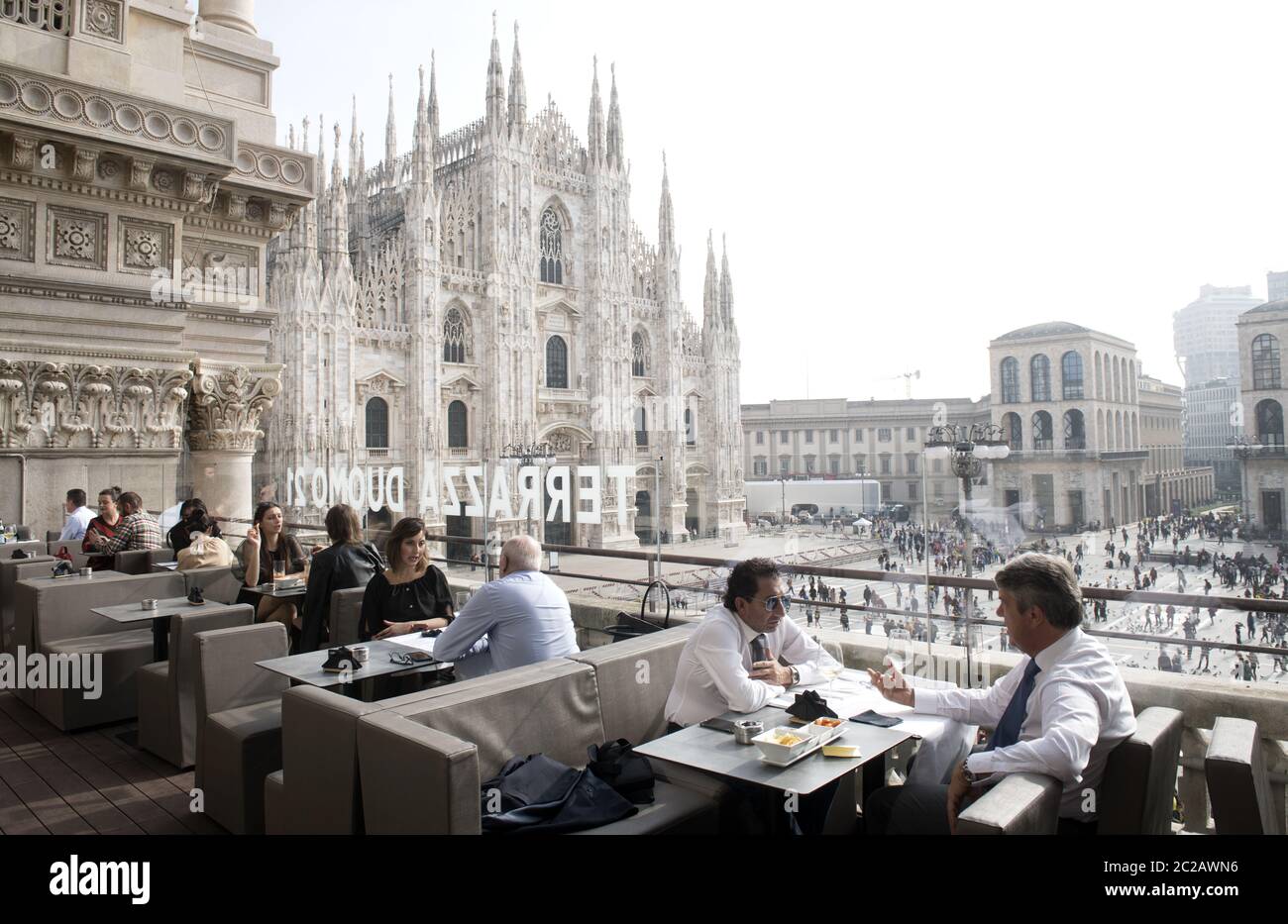 outdoor terrace restaurant on top of Duomo square, with the Duomo ...