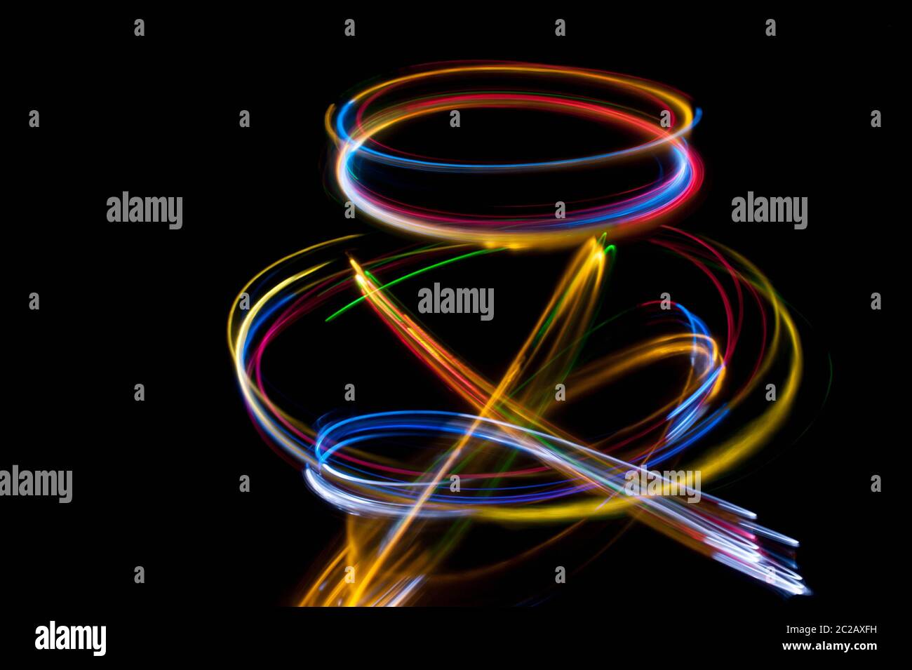 colored streaks of light in the dark Stock Photo - Alamy