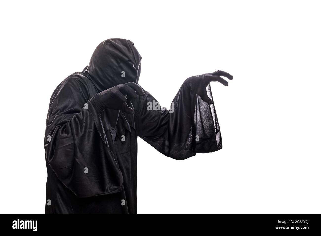 Spooky monster in hooded cloak isolated on white background Stock Photo ...
