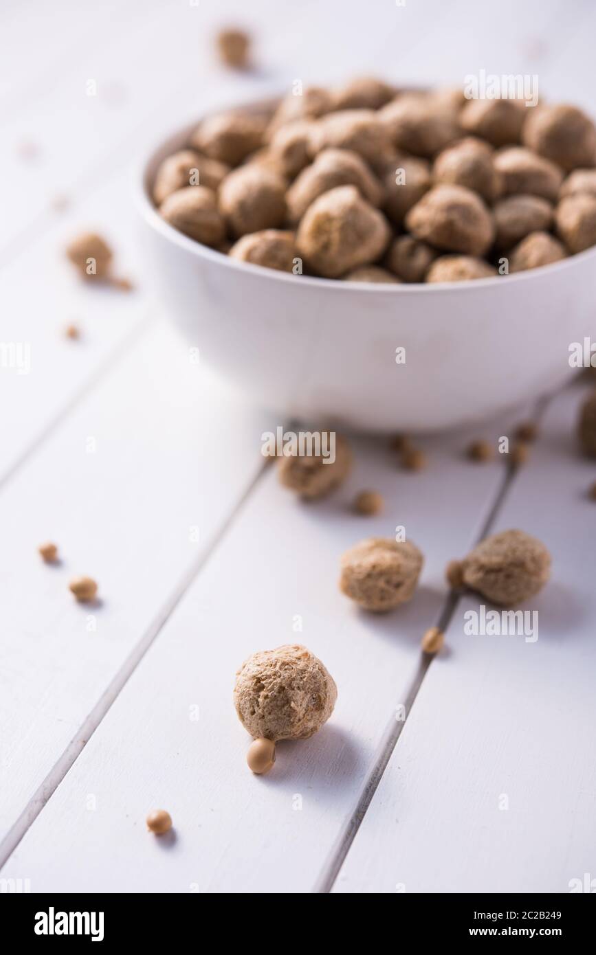 Raw Soya Chunks, Soy Meat for vegans isolated on colourful background ...