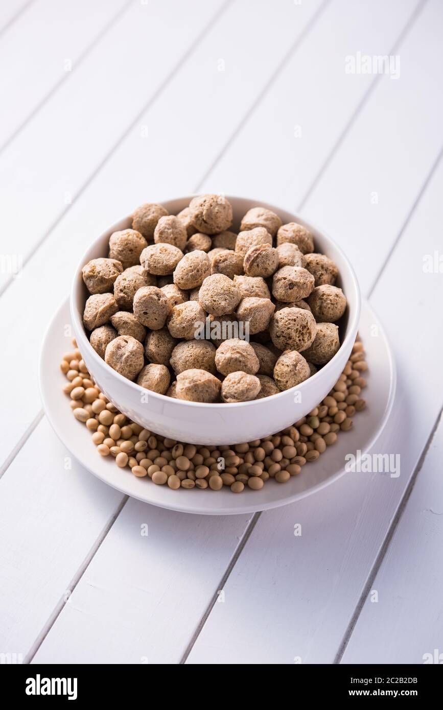 Raw Soya Chunks, Soy Meat for vegans isolated on colourful background ...