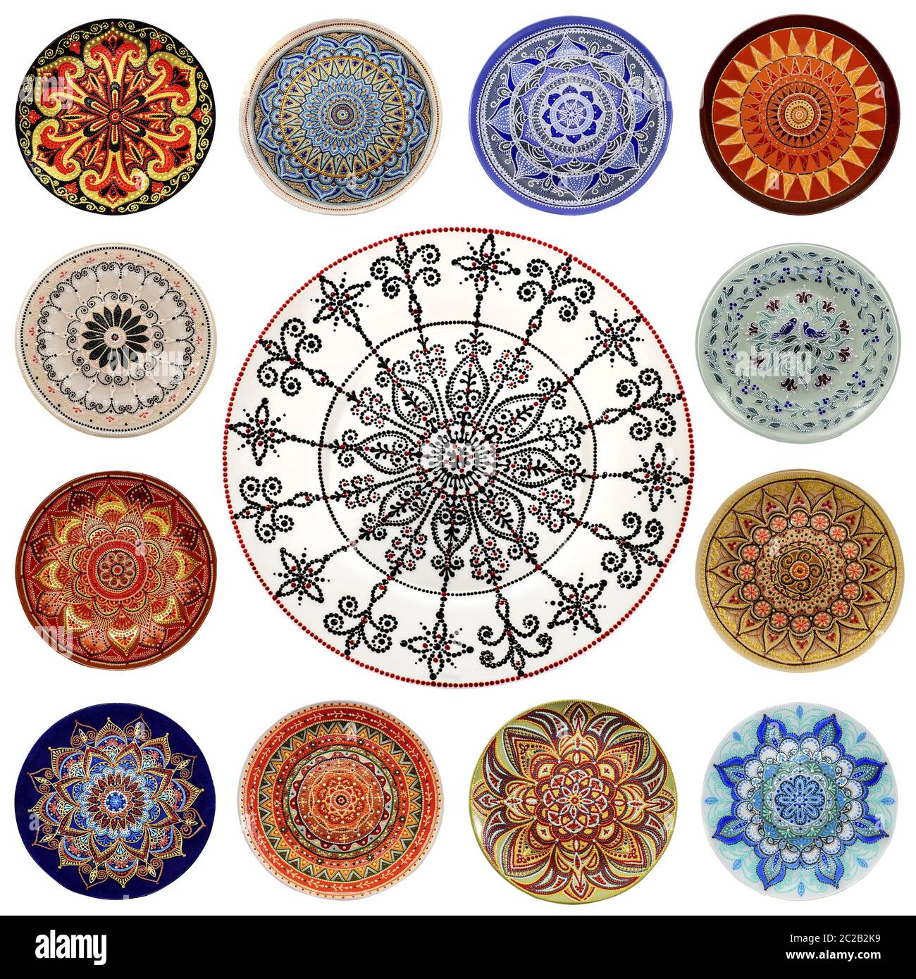 Set of decorative ceramic dishes hand-painted with acrylic paints ...