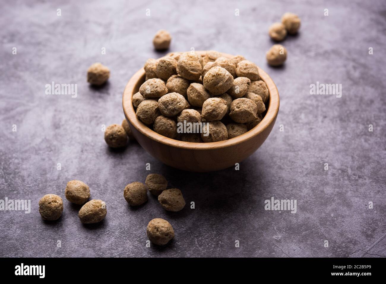 Raw Soya Chunks, Soy Meat for vegans isolated on colourful background ...