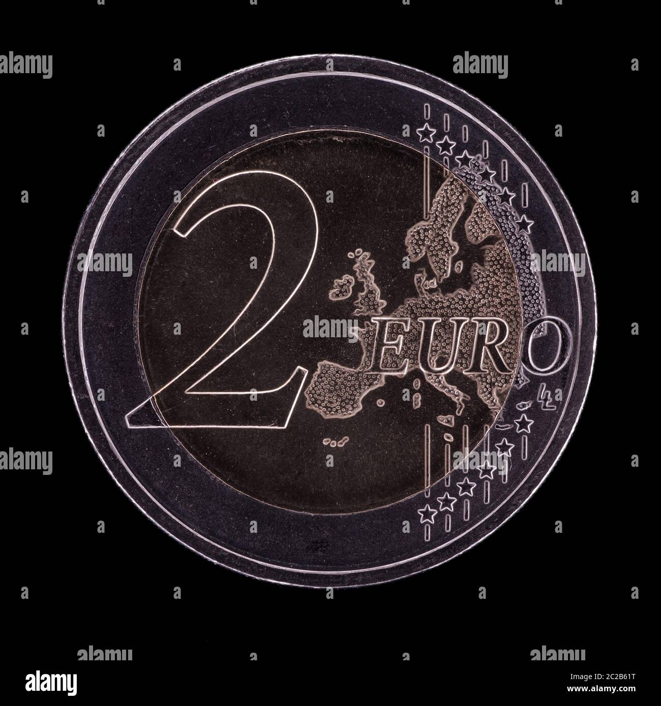 Austrian piece of a two Euro coin isolated on black background ...