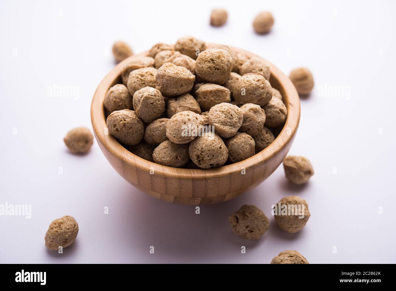 Raw Soya Chunks, Soy Meat for vegans isolated on colourful background ...