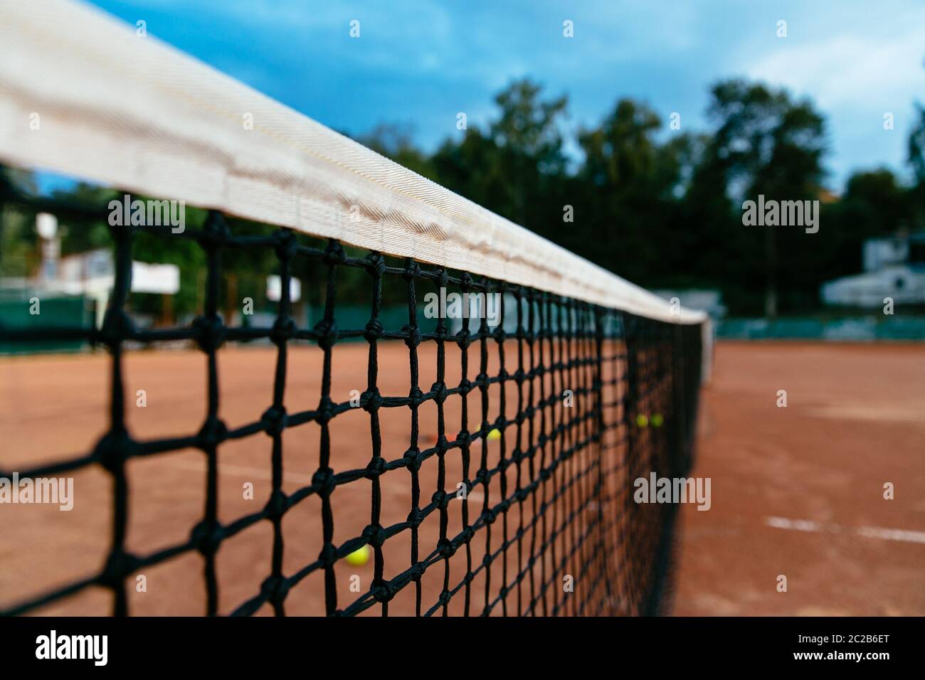 Tennis net on a tennis court background. Close-up Stock Photo - Alamy