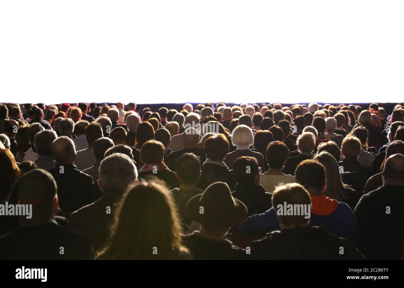 people in the audience during the event and the white screen can be ...