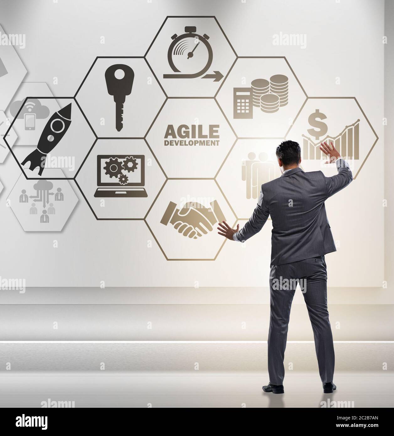 Businessman in agile software development concept Stock Photo - Alamy