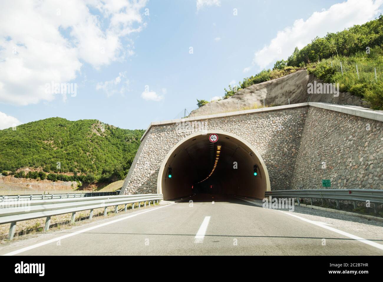 Highway entrance the tunnel. Empty freeway Stock Photo - Alamy