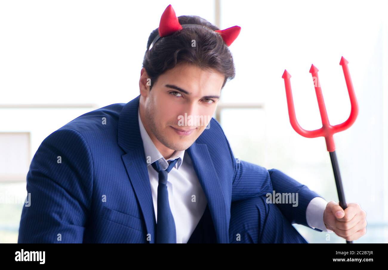 Devil angry businessman in the office Stock Photo - Alamy