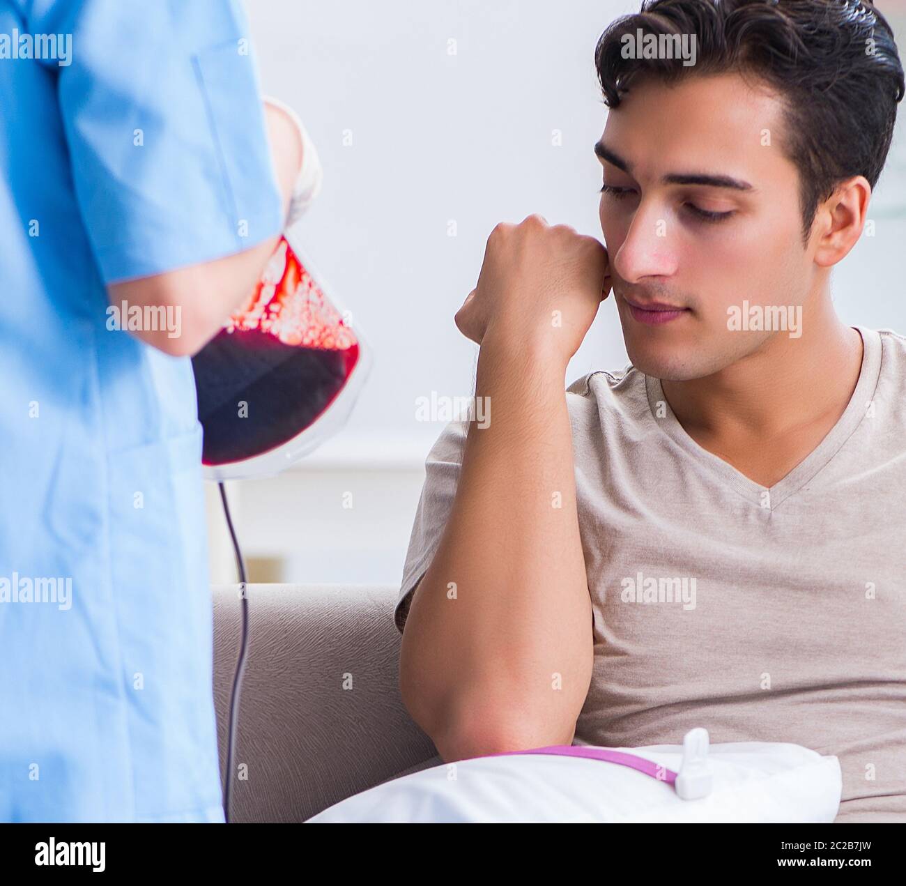 Patient getting blood transfusion in hospital clinic Stock Photo - Alamy