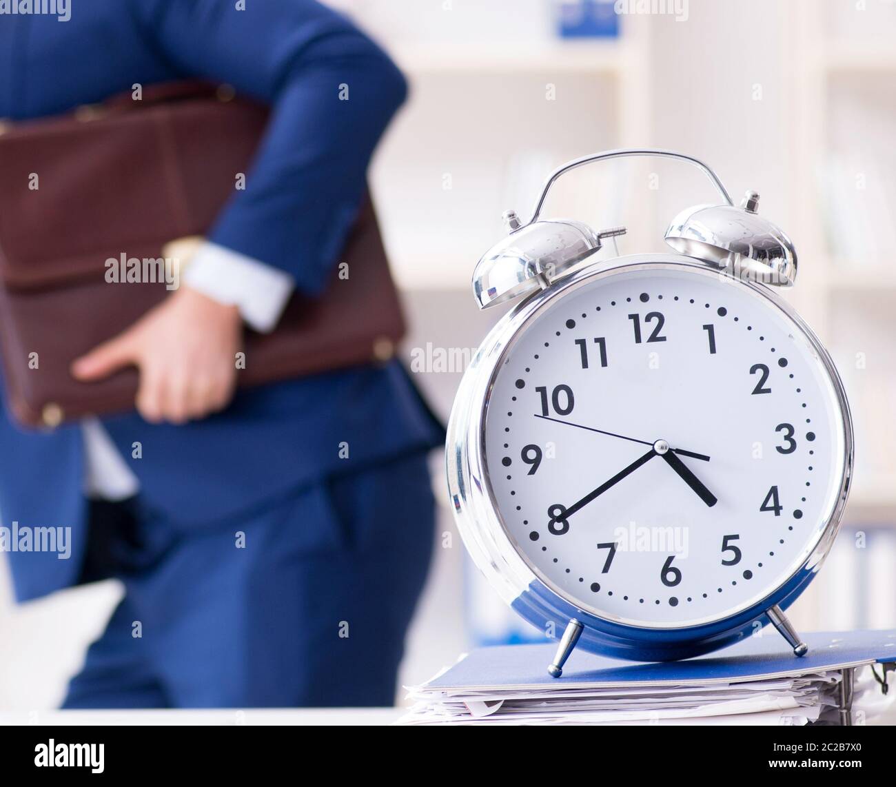 Businessman in rush trying to meet deadline Stock Photo - Alamy