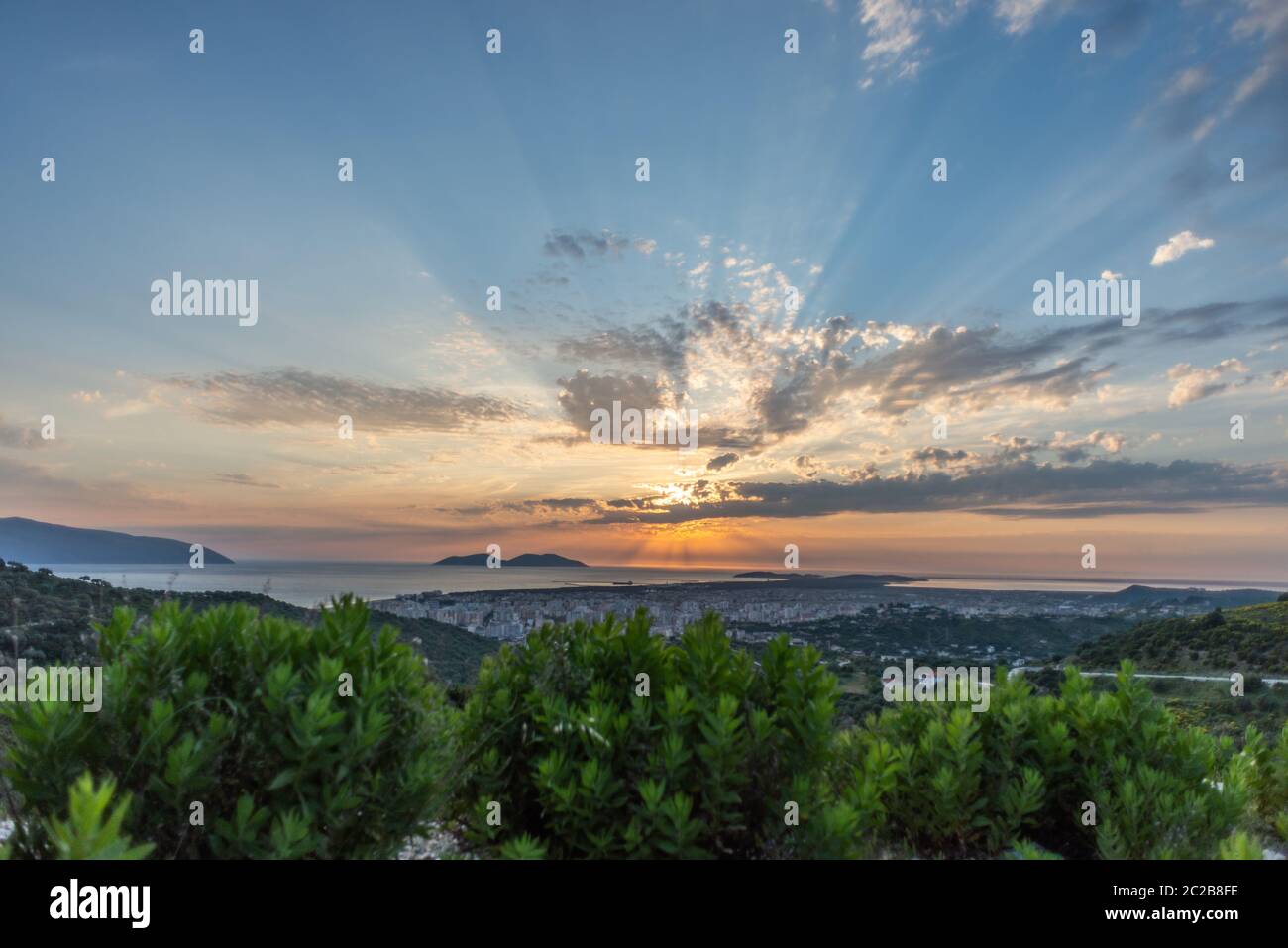 Sunset in Vlora city Stock Photo - Alamy