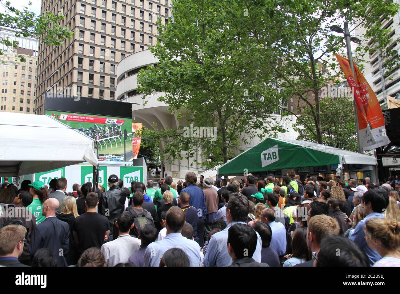 People gather in Martin Place, Sydney to place bets and watch the ...