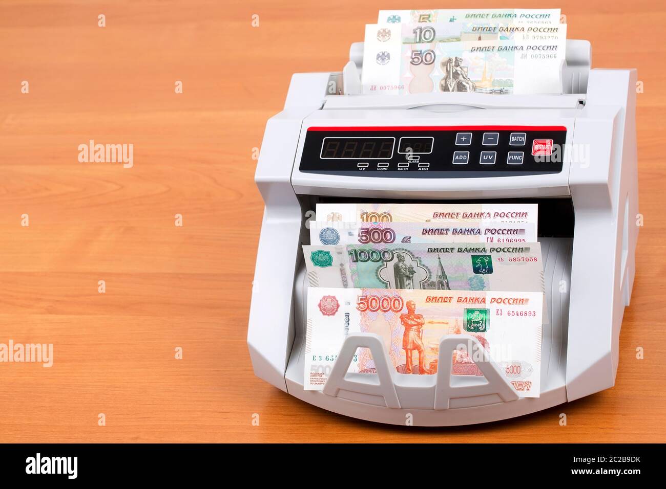 Russian ruble in a counting machine Stock Photo - Alamy
