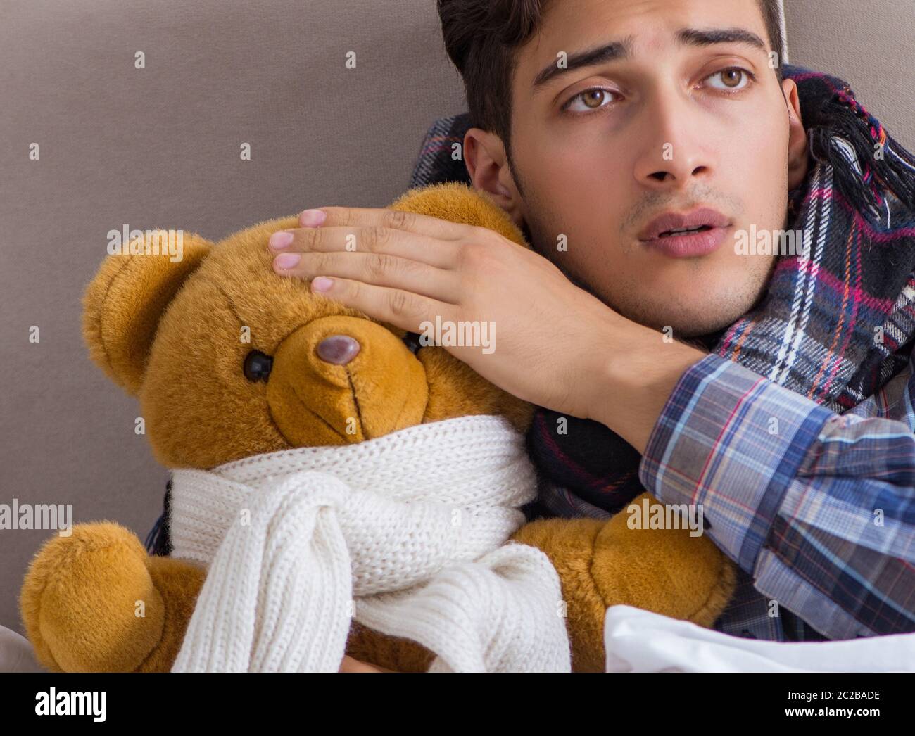 Sick man suffering from flu in the bed Stock Photo - Alamy