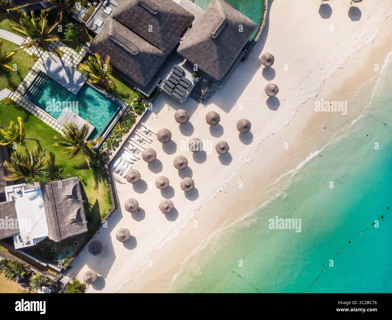 Aerial view of beautiful tropical beach front hotel resort with ...